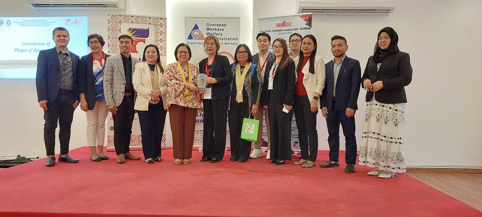 Top achievers honored as over 50 Filipino workers in Bahrain complete ...